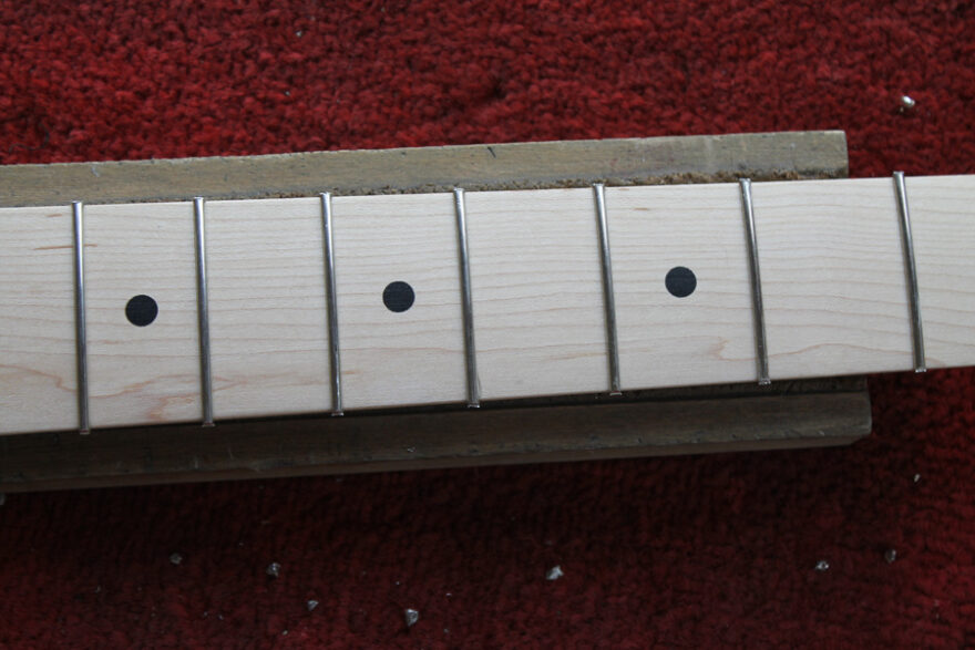 Fretting and finishing a guitar neck