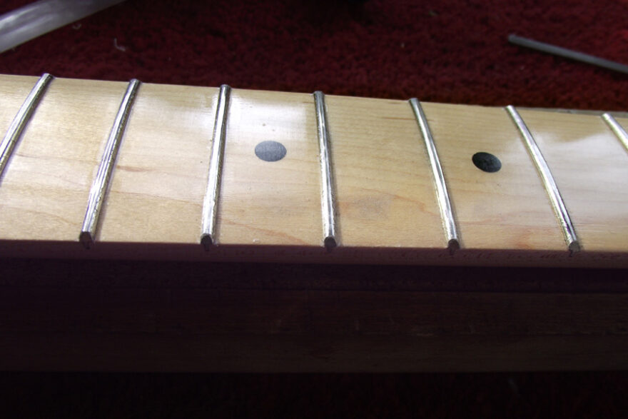 Dressing the frets on the maple neck – Manchester Guitar Tech