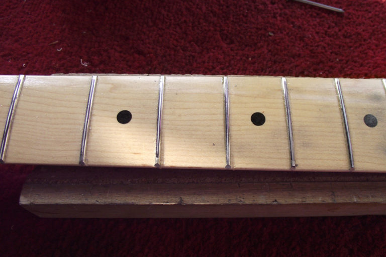 Dressing the frets on the maple neck – Manchester Guitar Tech